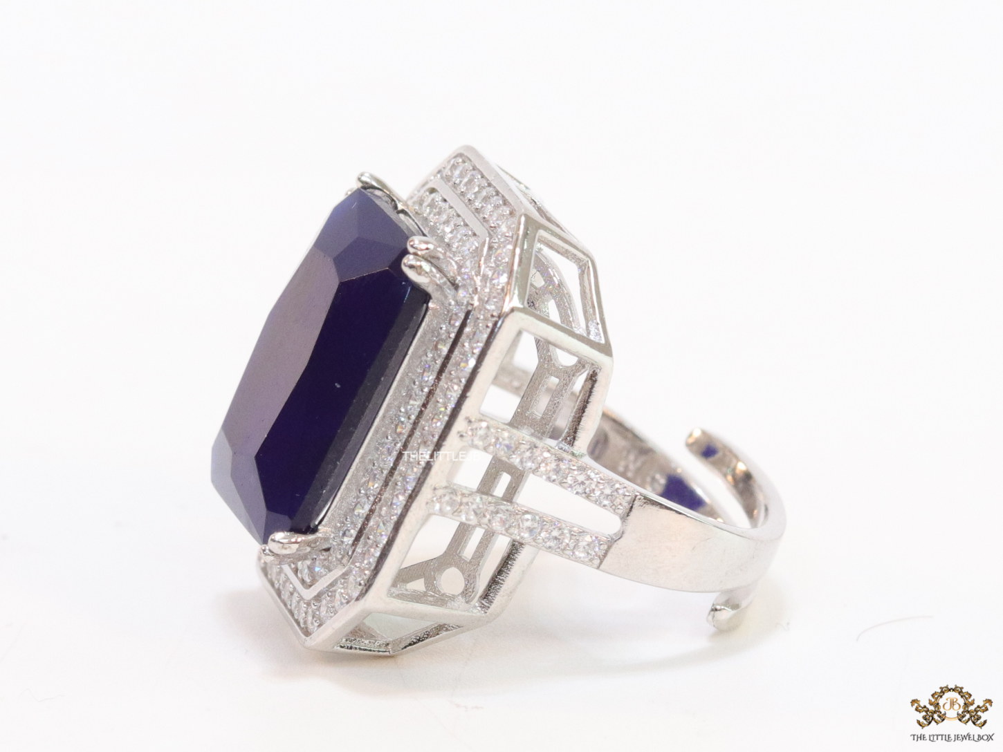 Big sapphire blue stone adjustable ring with studded cz stones – The ...